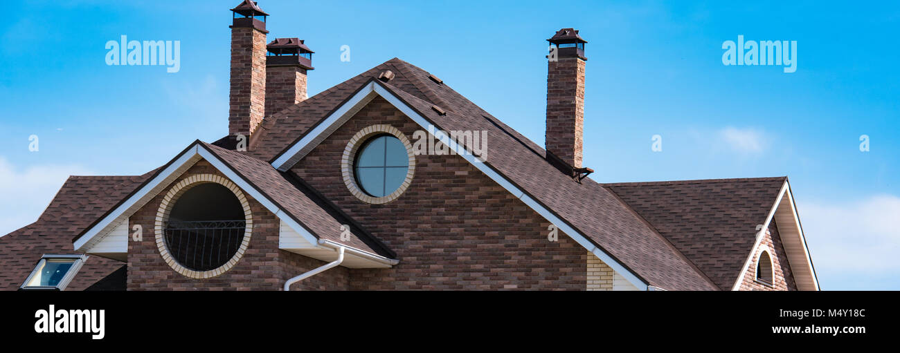 house with a gable roof window Stock Photo - Alamy