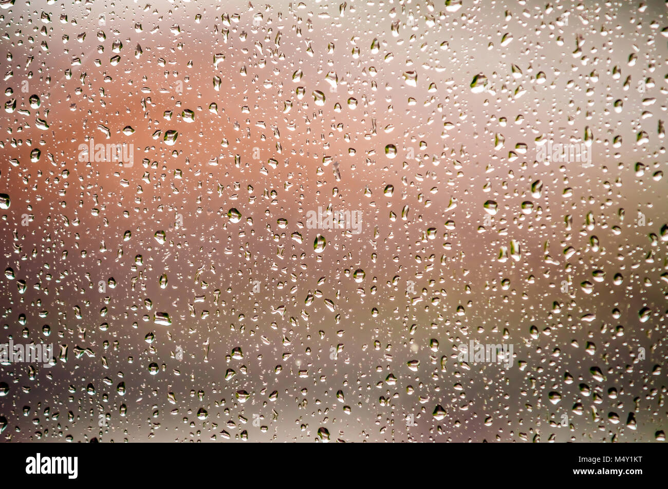 Raindrops on glass surface hi-res stock photography and images - Alamy
