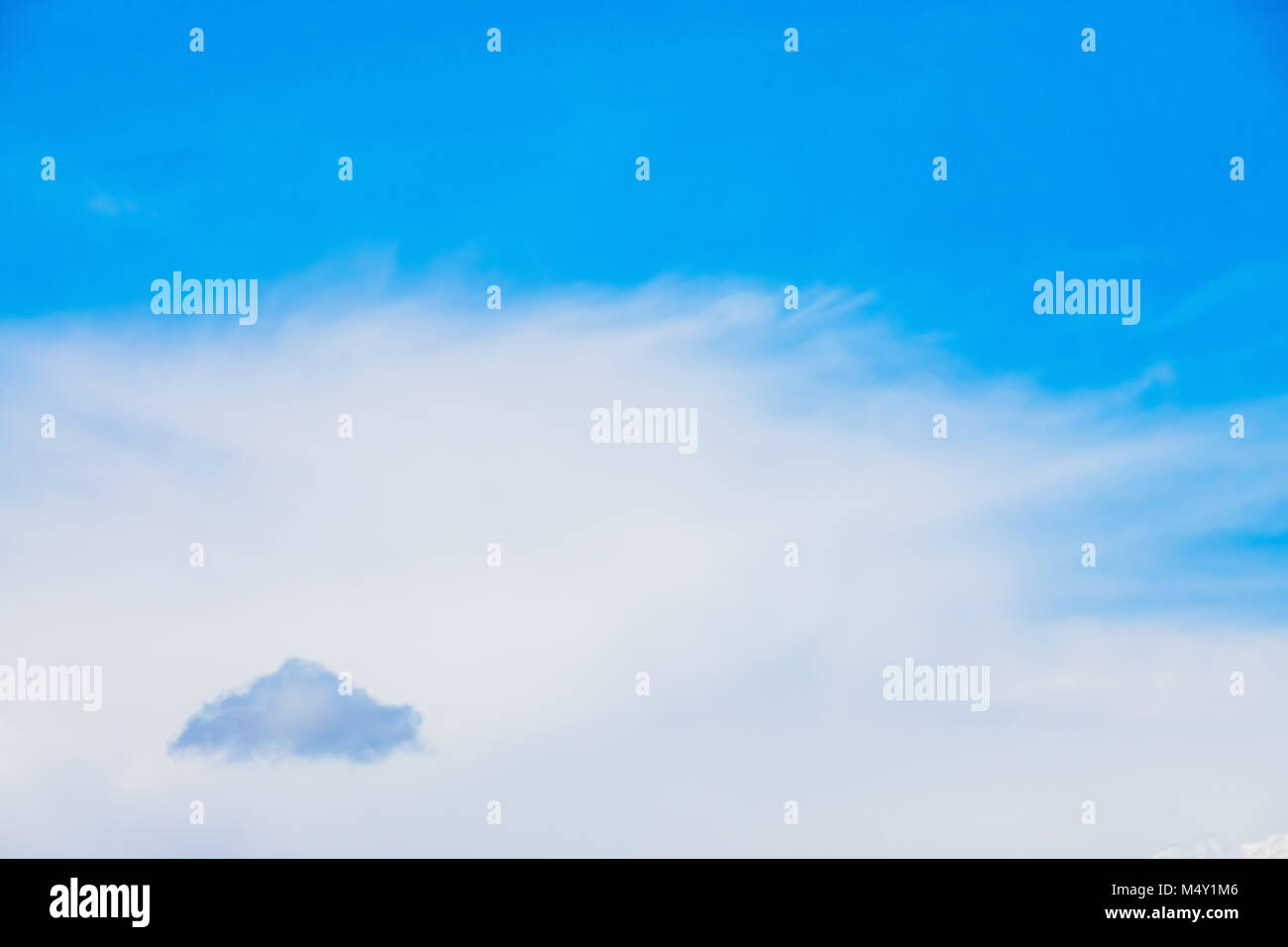 Small dark cloud and summer sky Stock Photo - Alamy