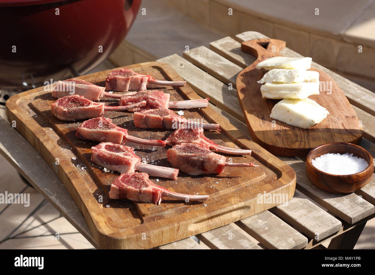 Lamb cutlets dressed and prepared ready to barbecue Stock Photo - Alamy
