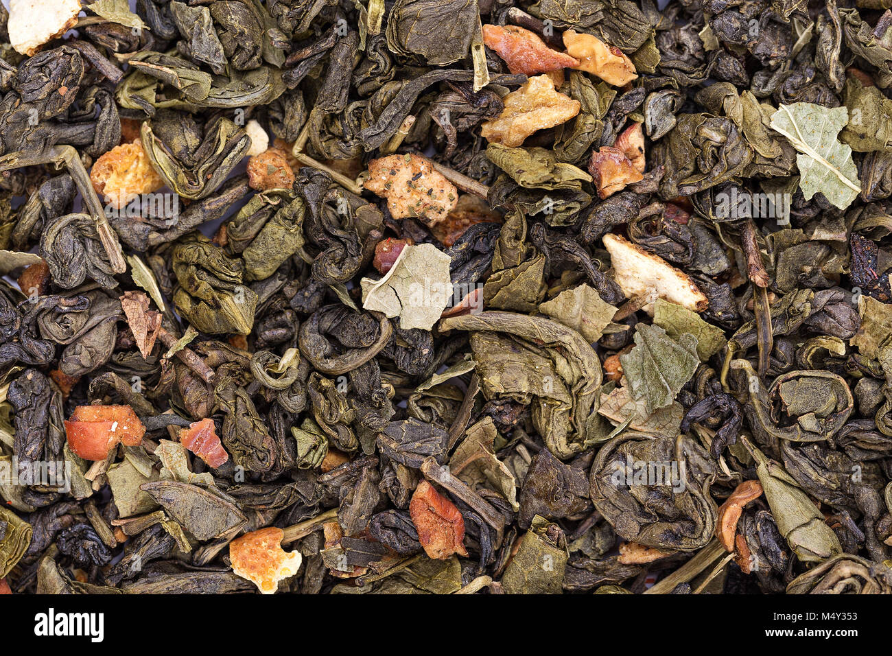 tea leaves Scatter green tea with fruit, traditional Chinese drink ...