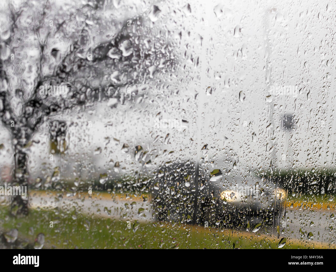 Rain drops on windshield driving hi-res stock photography and images ...