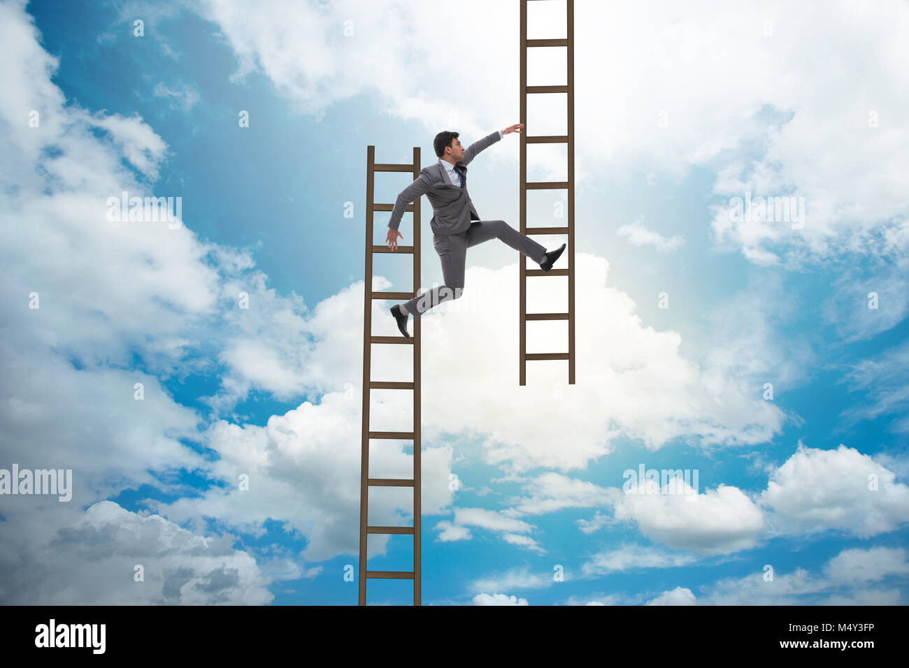 Businessman climbing career ladder in business concept Stock Photo - Alamy