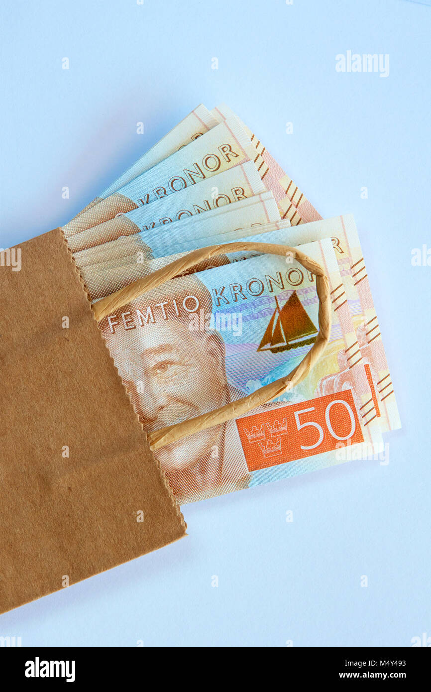 Swedish kroner cash in a brown paper bag Stock Photo - Alamy