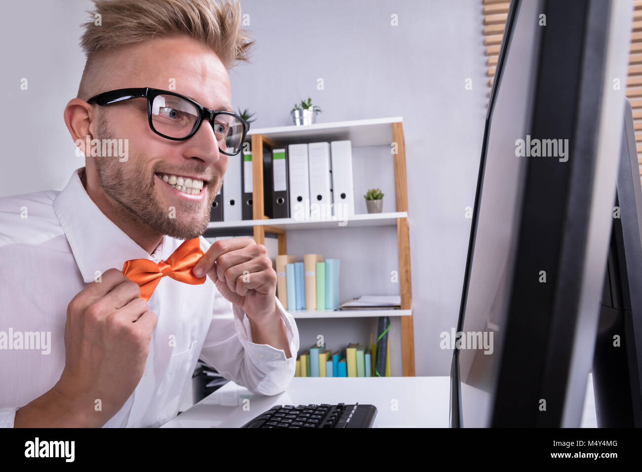 Business man holding bow hi-res stock photography and images - Alamy