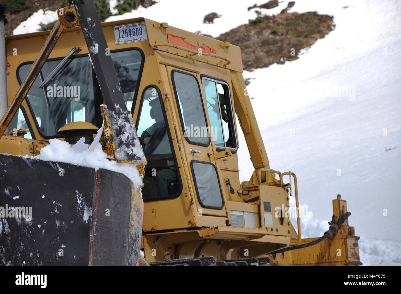 Snow plow operator Stock Photo - Alamy