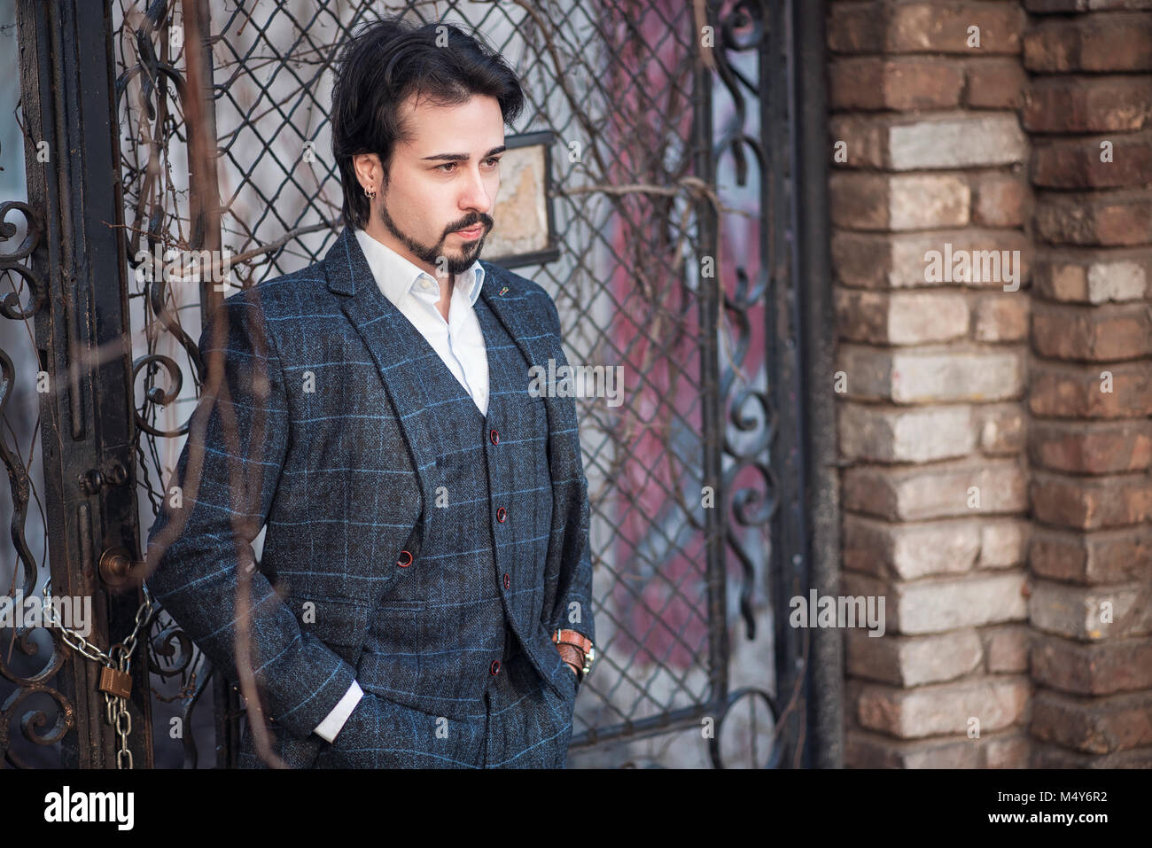 Young man in vintage english tweed suit Stock Photo - Alamy