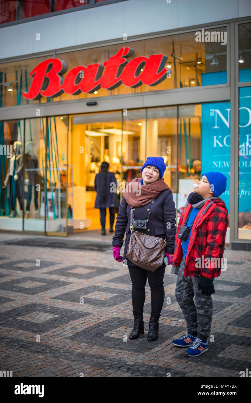 PRAGUE, CZECH REPUBLIC - MARCH 5, 2016: Asian boy and mom are travel in ...