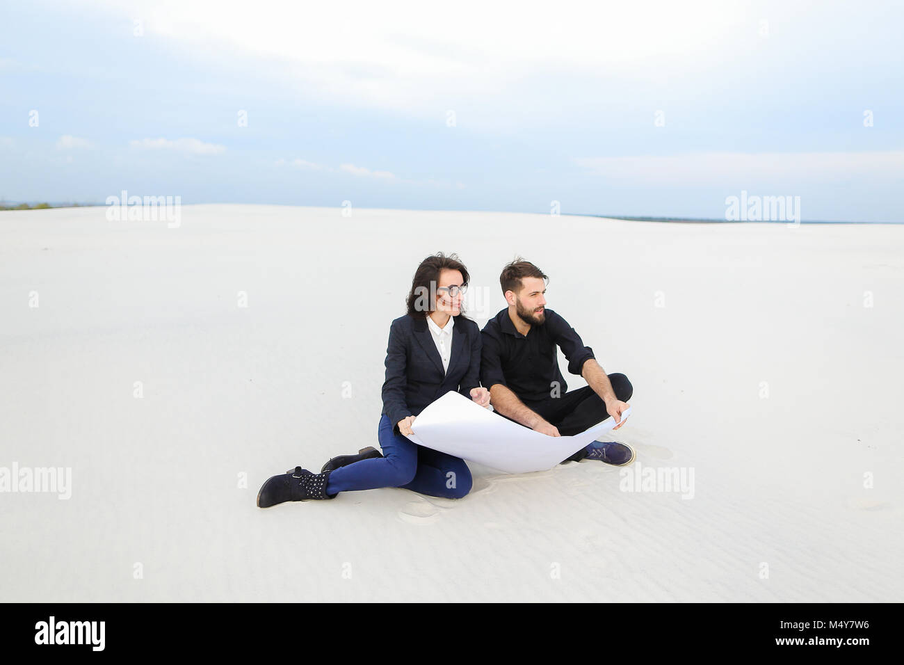 Economists brother and sister planning shopping center in dese Stock ...