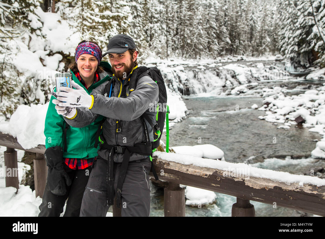 Winter Visitors Taking a photo at Sacred Dancing Cascades Stock Photo ...