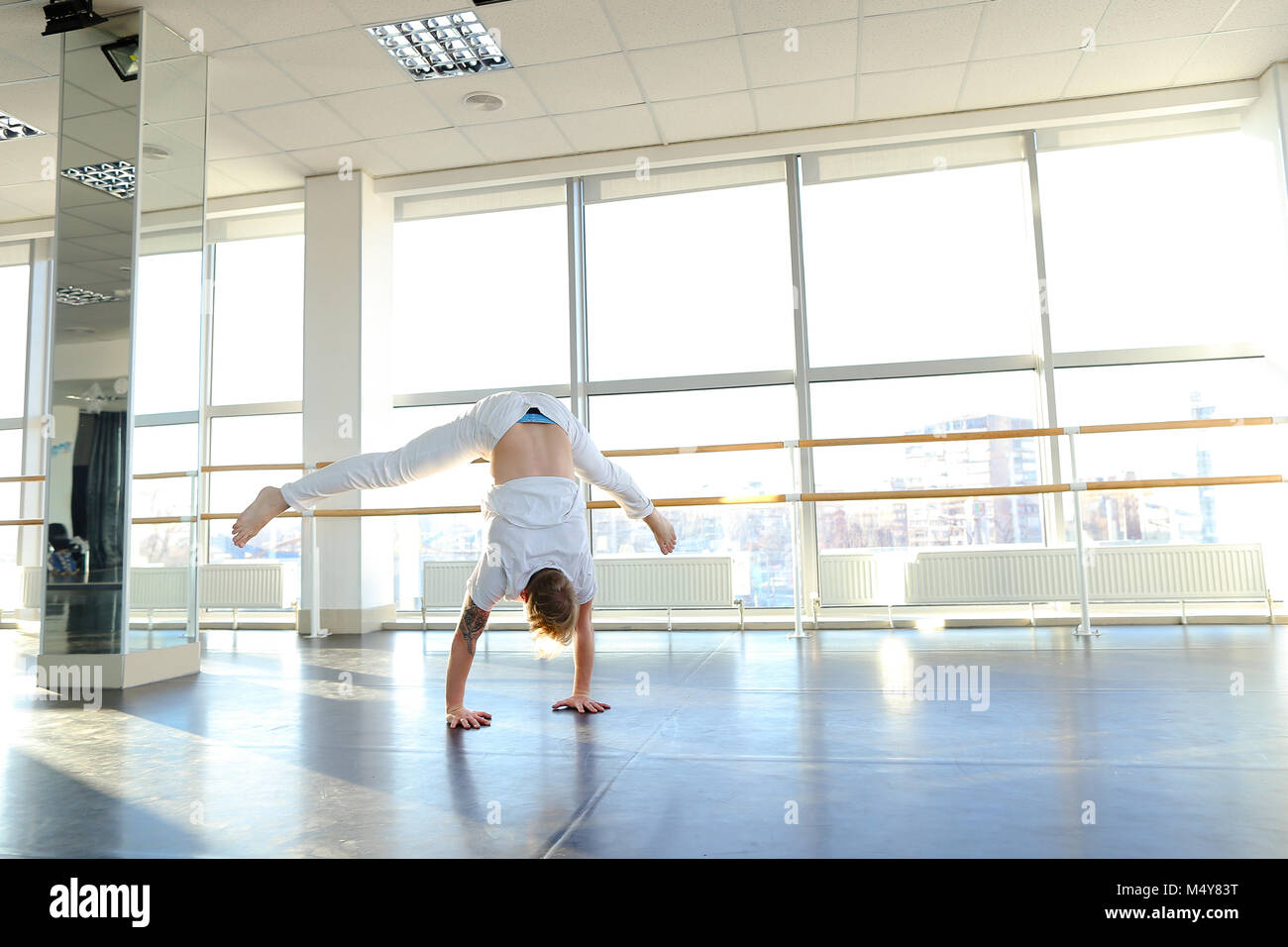 Man doing vigorous movements and swipe Stock Photo - Alamy