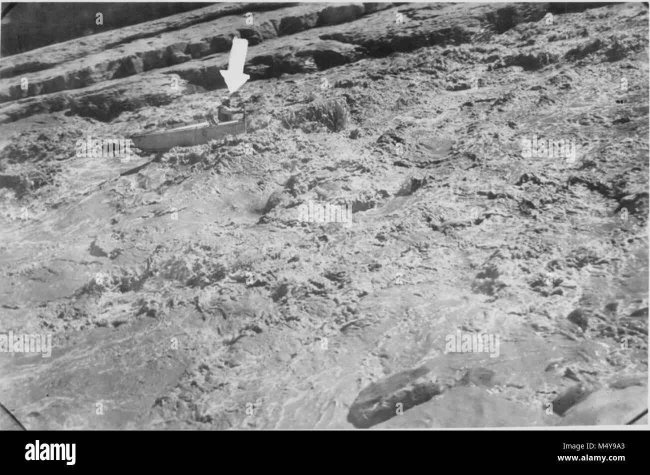 A COLORADO RIVER HAZARD, DECEMBER 1937. CHIEF BOATMAN DODGE, OF THE ...