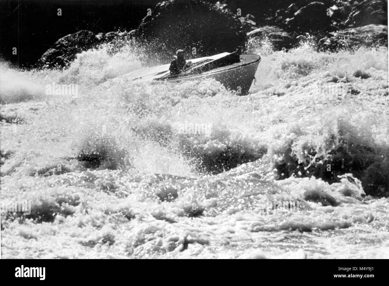 OTIS "DOCK" MARSTON (?) GOING UPSTREAM IN A SPEED BOAT THROUGH LAVA ...