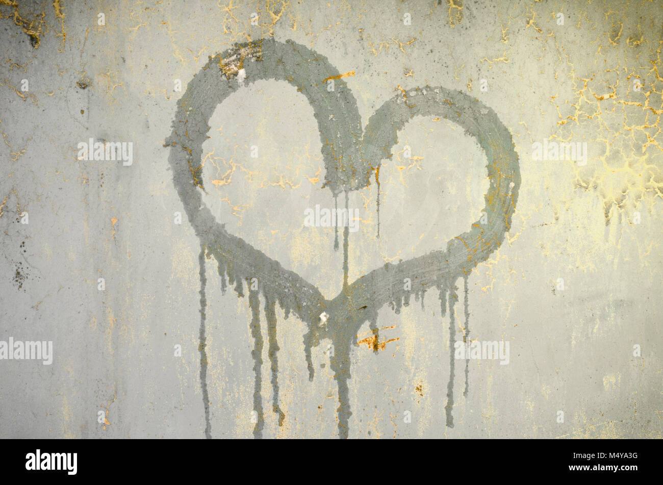painted heart on a rusty iron background. metallic rust texture with ...
