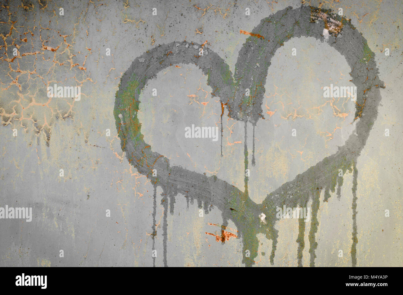 painted heart on a rusty iron background. metallic rust texture with ...