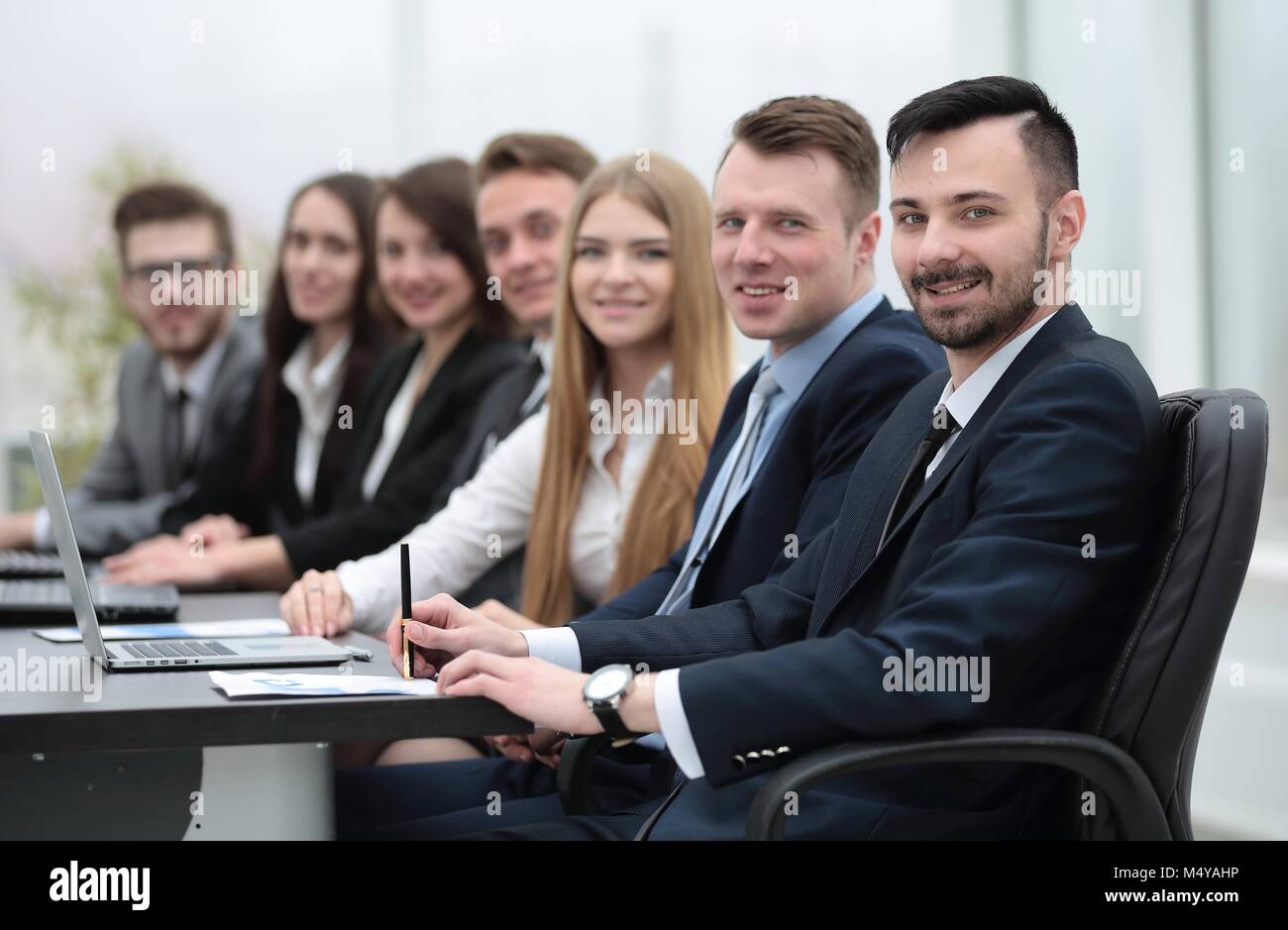 business team sitting at Desk in the conference room Stock Photo - Alamy
