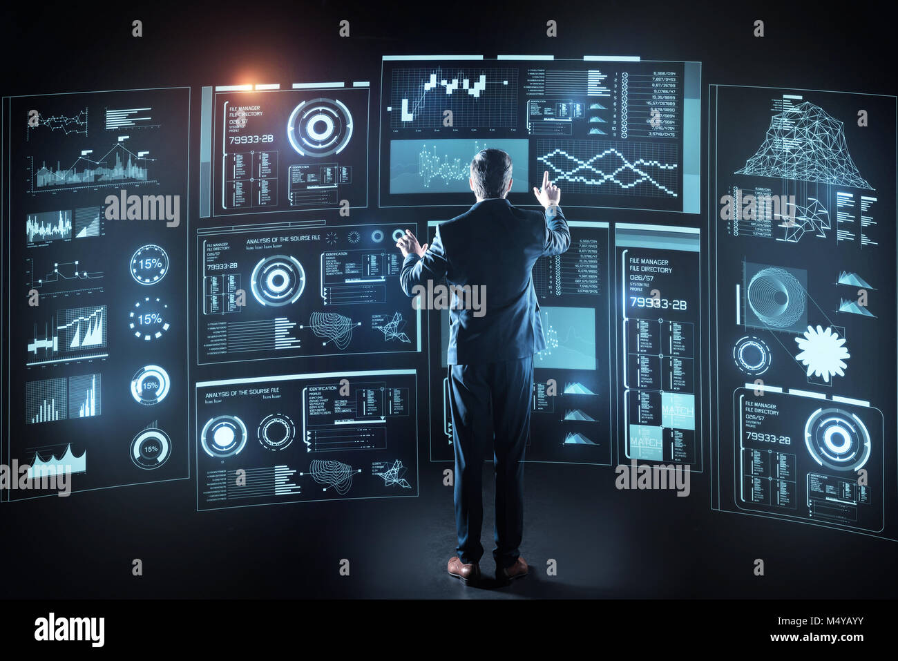 Enthusiastic programmer facing the screen of his computer while working ...