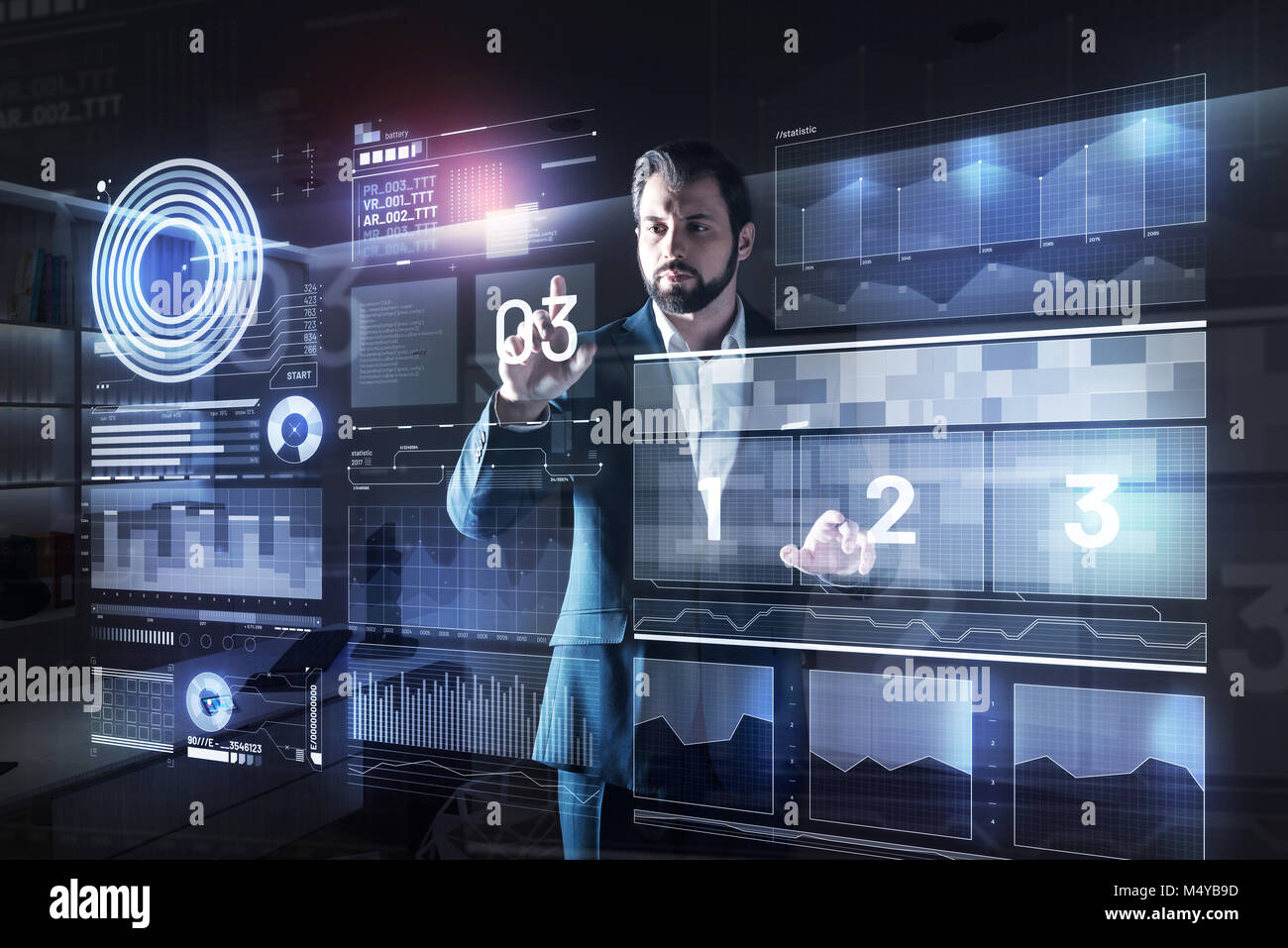 Attentive Programmer Checking The Numbers On The Screen While Working