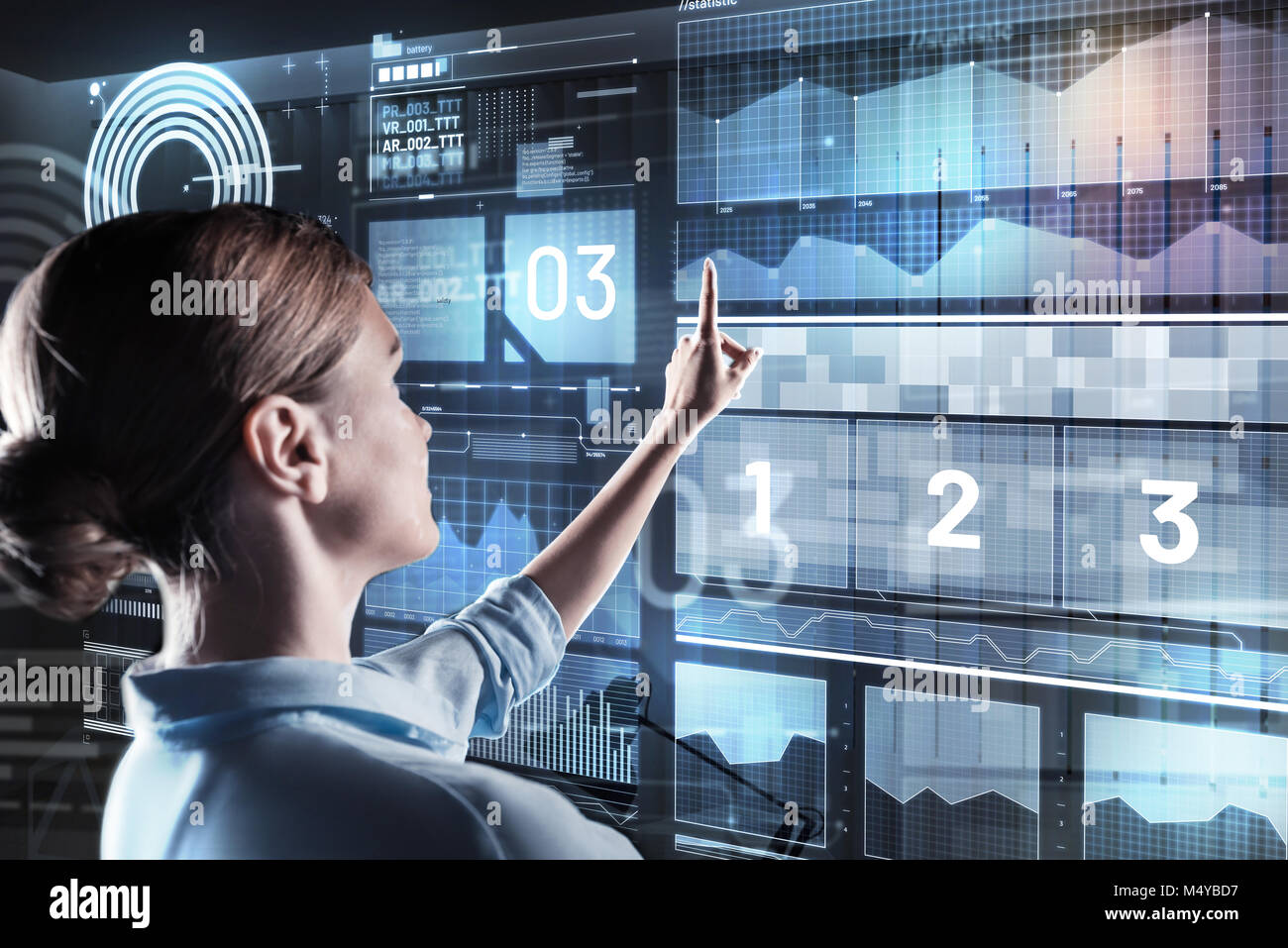 Attentive Programmer Touching The Screen While Analyzing Details Stock