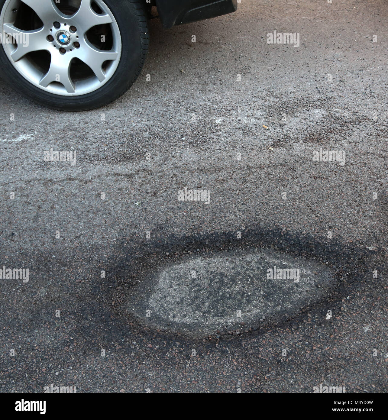 Potholes on roads in north London. Councils accused of putting lives at ...