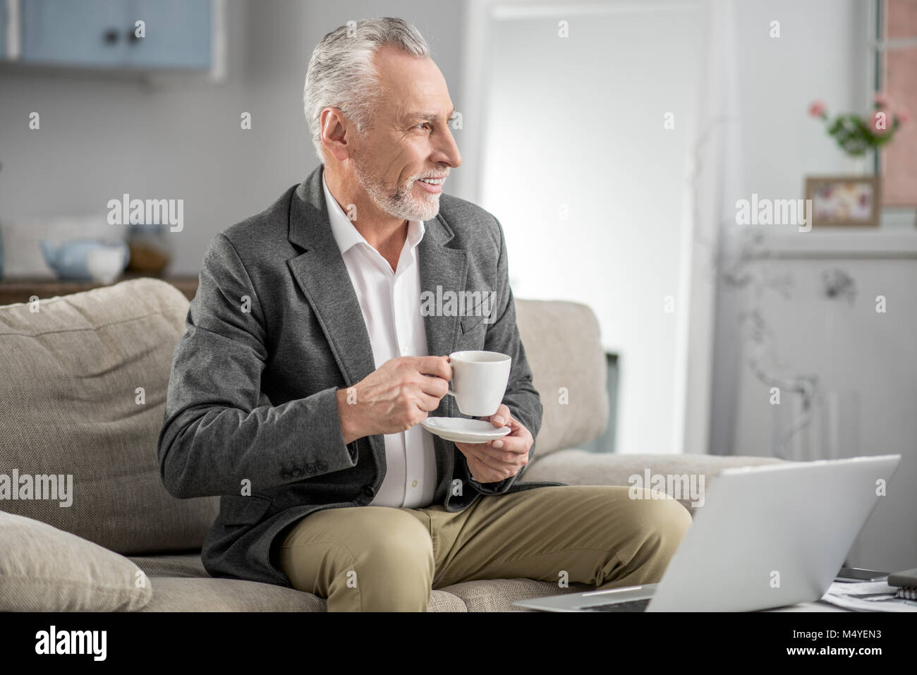 Dreamy man having free time Stock Photo - Alamy