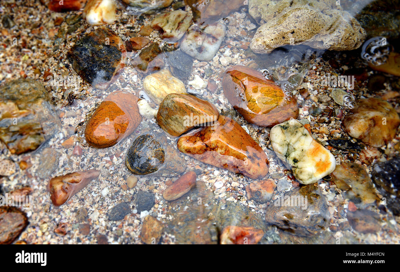 Wet colorful stones hi-res stock photography and images - Alamy