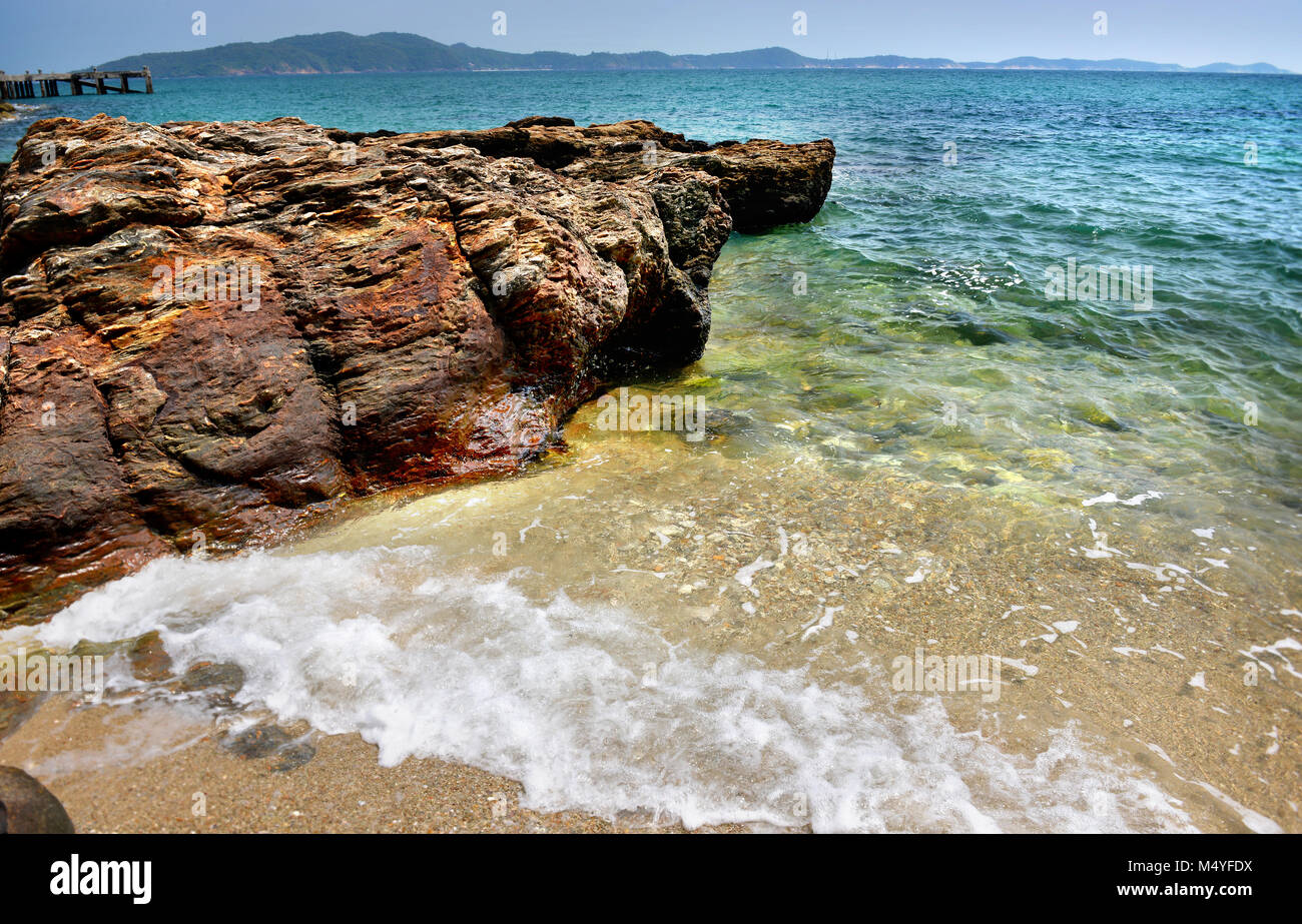 tropical rock sea and sand in summer sunlight Stock Photo - Alamy