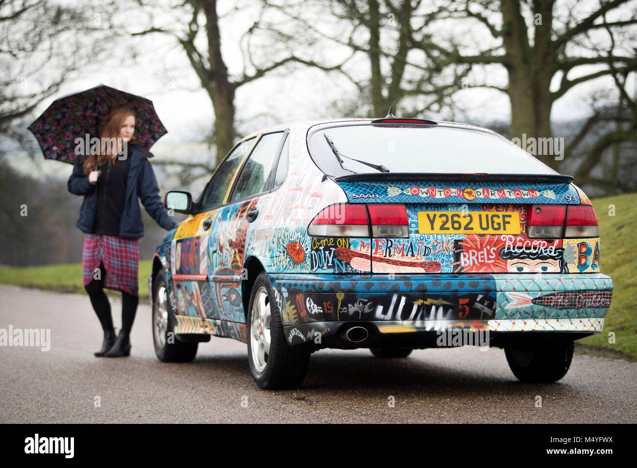 Helen Tulloch walks past Darktown Turbo Taxi by artist Jonny Hannah as ...