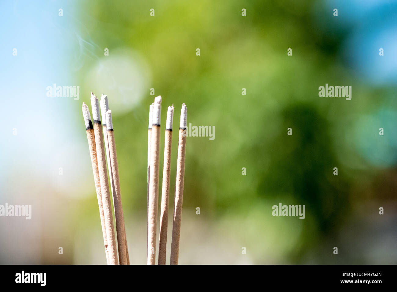 burning Embossed sticks and smoke from incense burning and smoke Stock ...