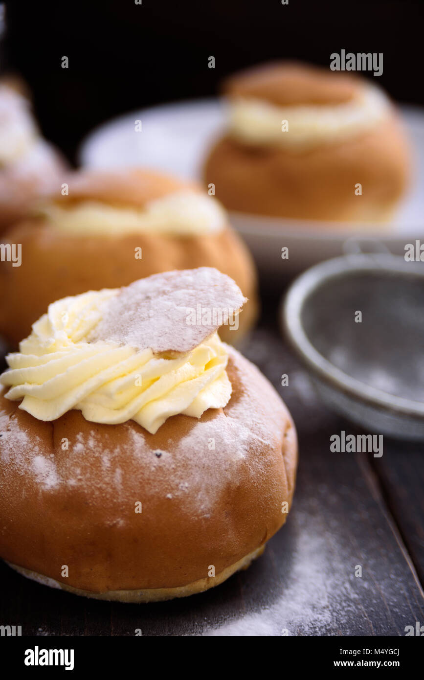 Semla swedish cream bun on dark wooden background Stock Photo - Alamy