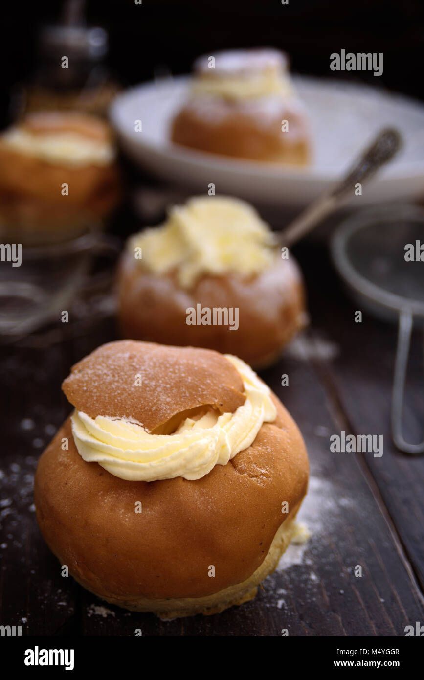 Semla swedish cream bun on dark wooden background Stock Photo - Alamy