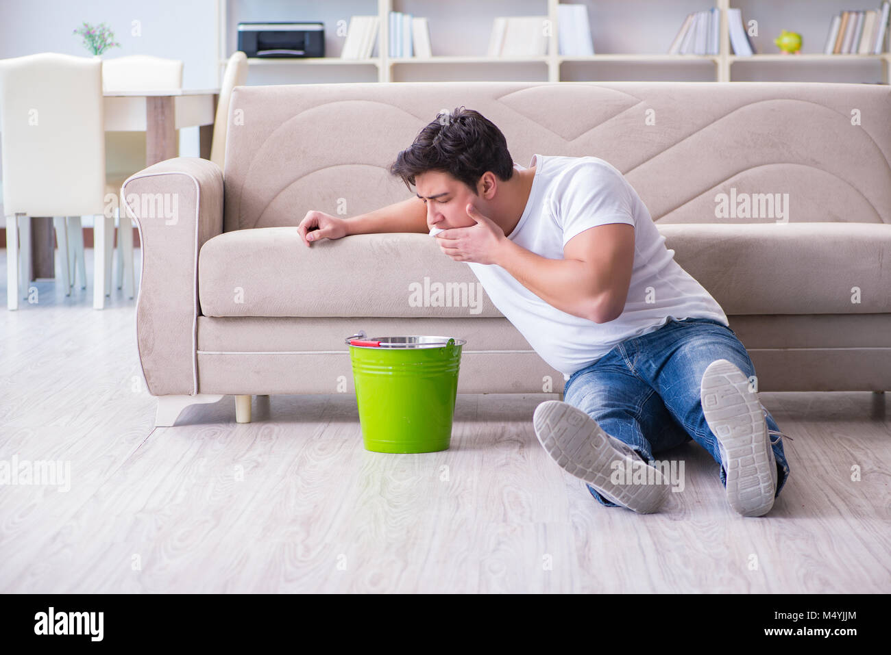 Man suffering from sick stomach and vomiting Stock Photo - Alamy