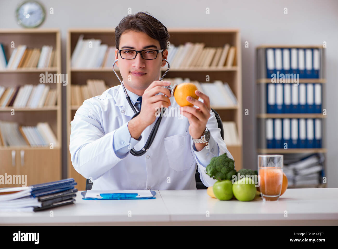 Scientist studying nutrition in various food Stock Photo - Alamy