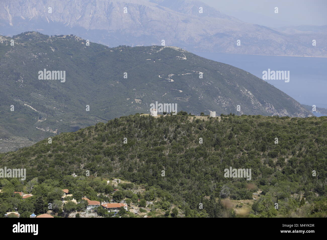 Old Greek wind mills in the mountains Stock Photo - Alamy