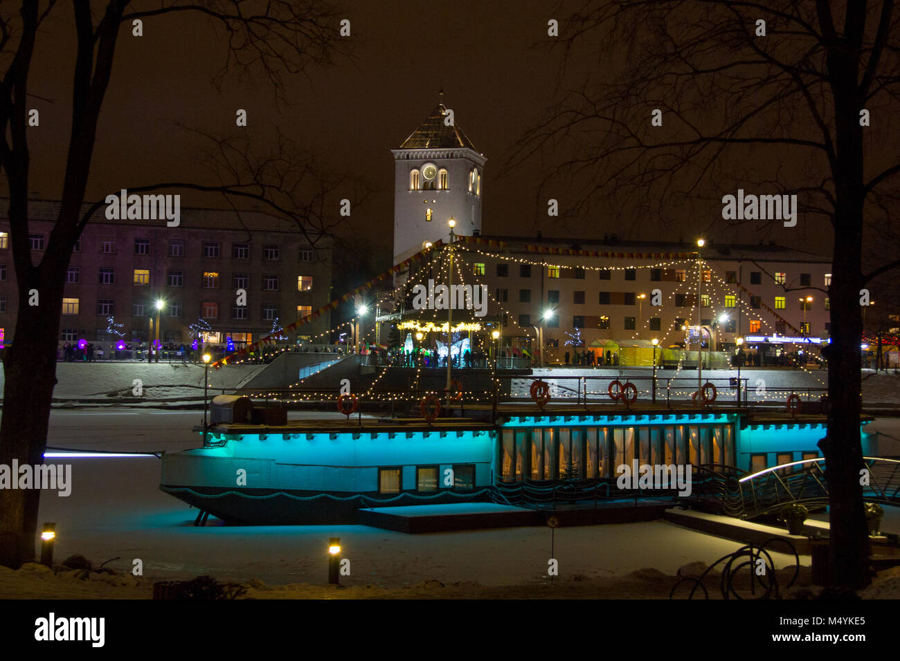 Jelgava Pasta island in winter nignht cafe ship and Holy Trinity Church ...