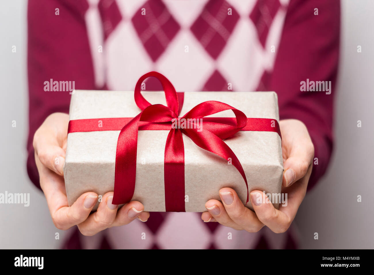 Gift box in hands. Celebration Stock Photo - Alamy