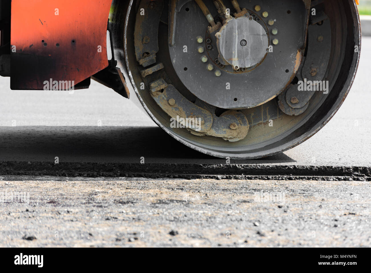New asphalt laying Stock Photo - Alamy