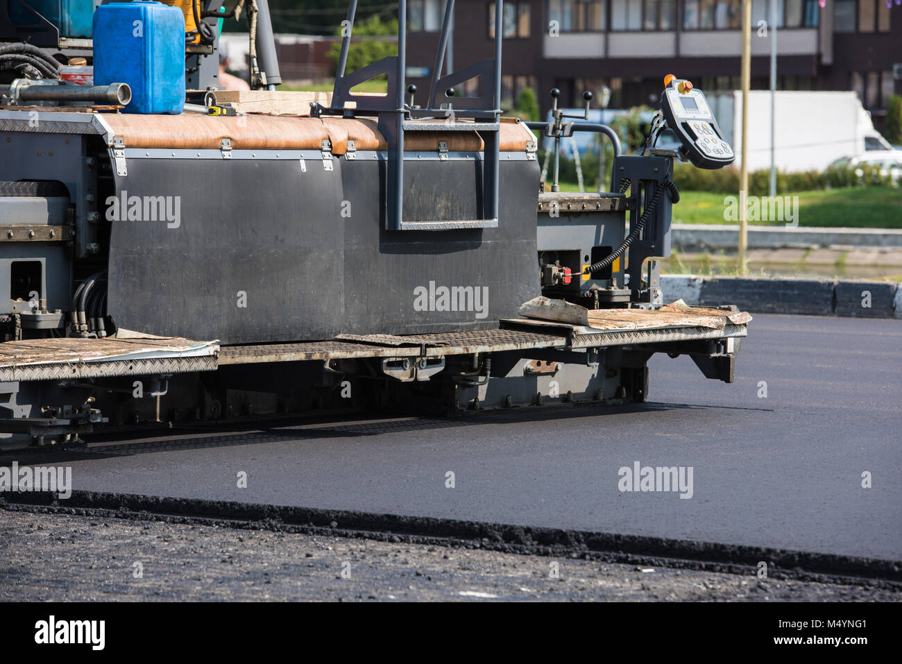 New asphalt laying Stock Photo - Alamy