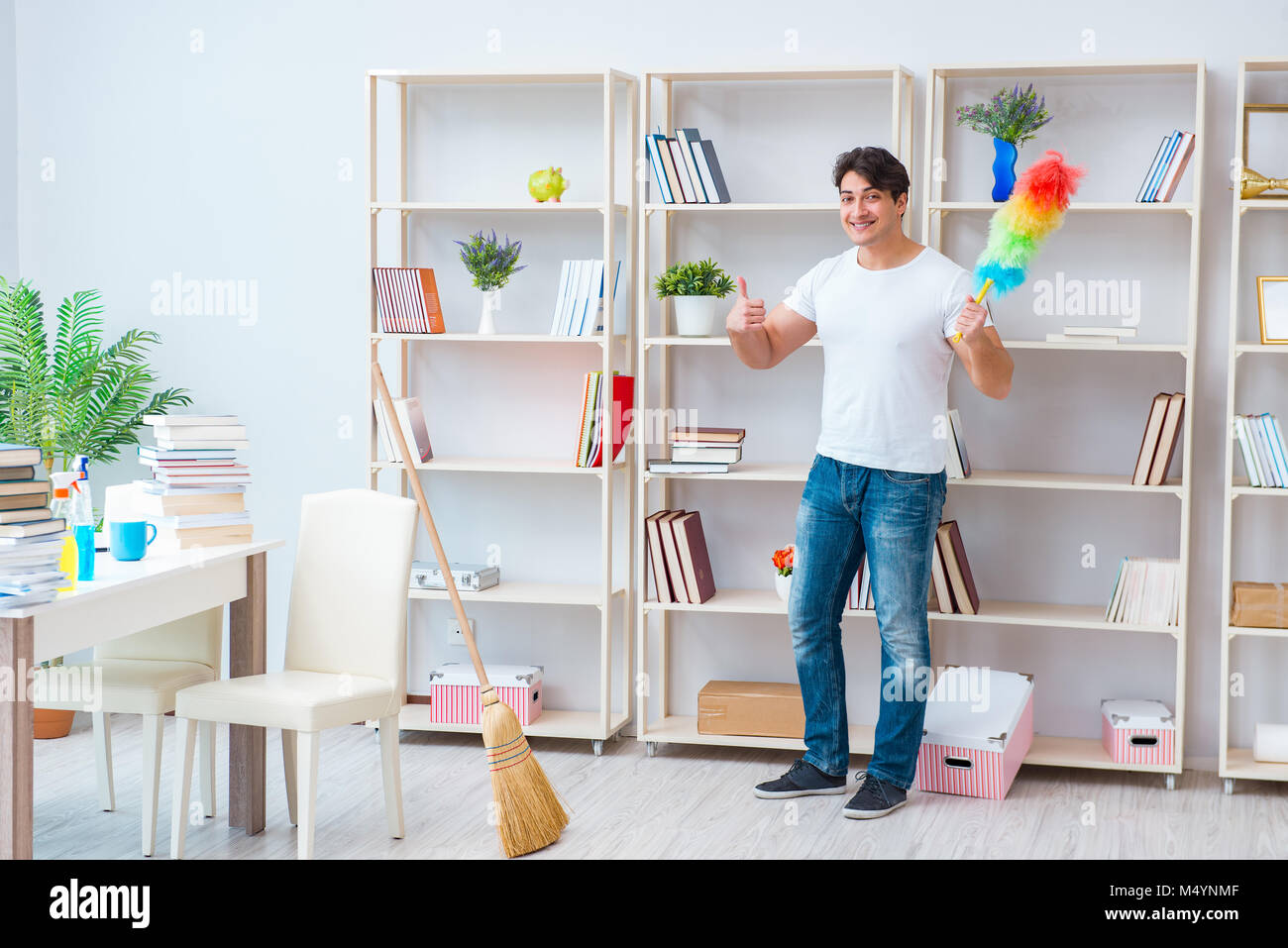 Man doing cleaning at home Stock Photo - Alamy