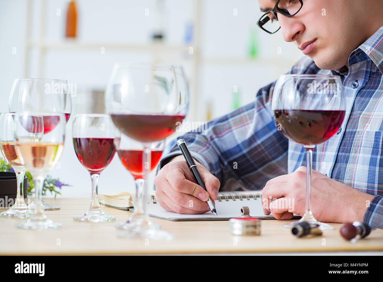 Professional sommelier tasting red wine Stock Photo - Alamy