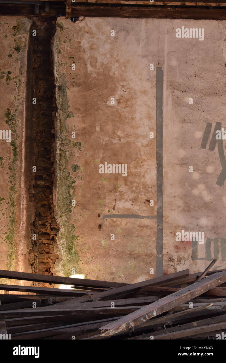 Interior of abandoned shed with remains of building materials Stock ...