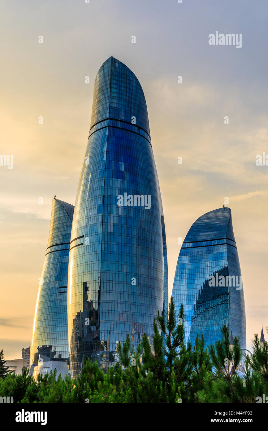 Three flame towers skyscrapers on the sunset in the city center, Baku ...