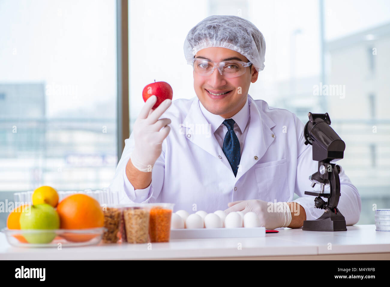 Nutrition expert testing food products in lab Stock Photo - Alamy