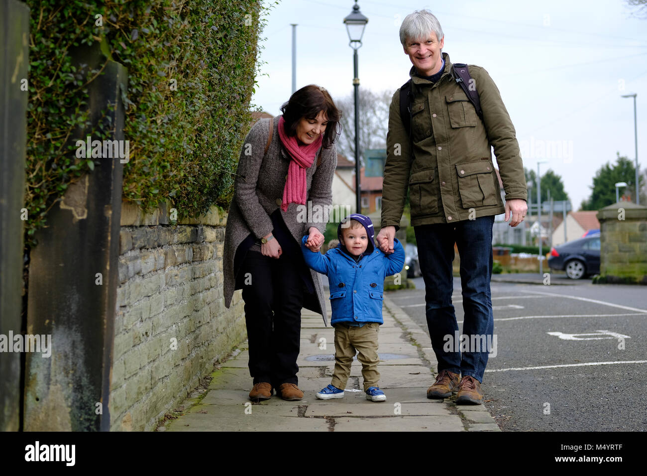Toddler Walking Holding Hands Stock Photos & Toddler Walking Holding ...