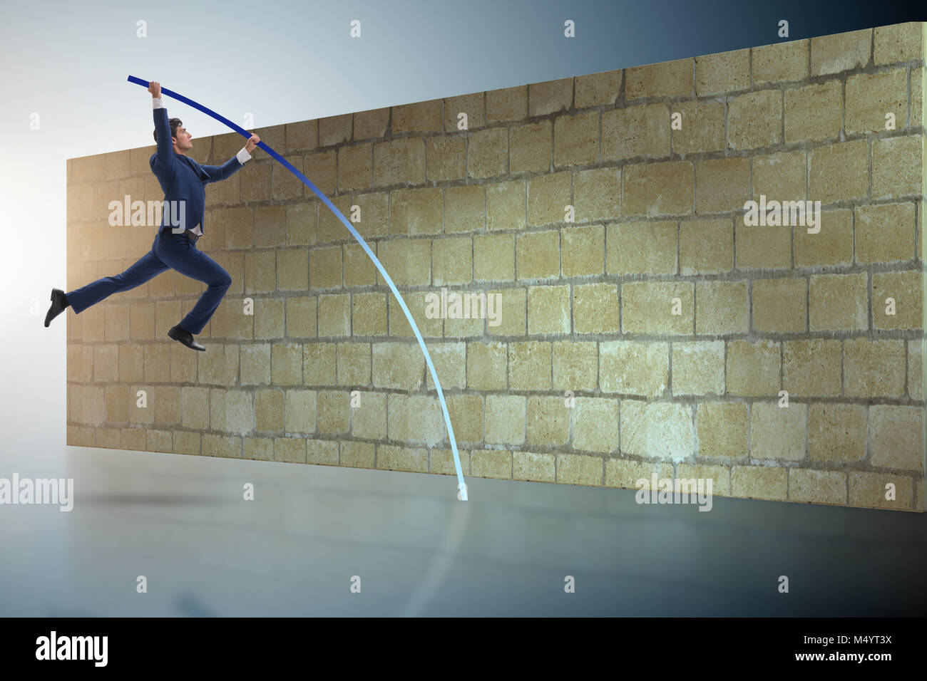 Man jumping over stone wall hi-res stock photography and images - Alamy