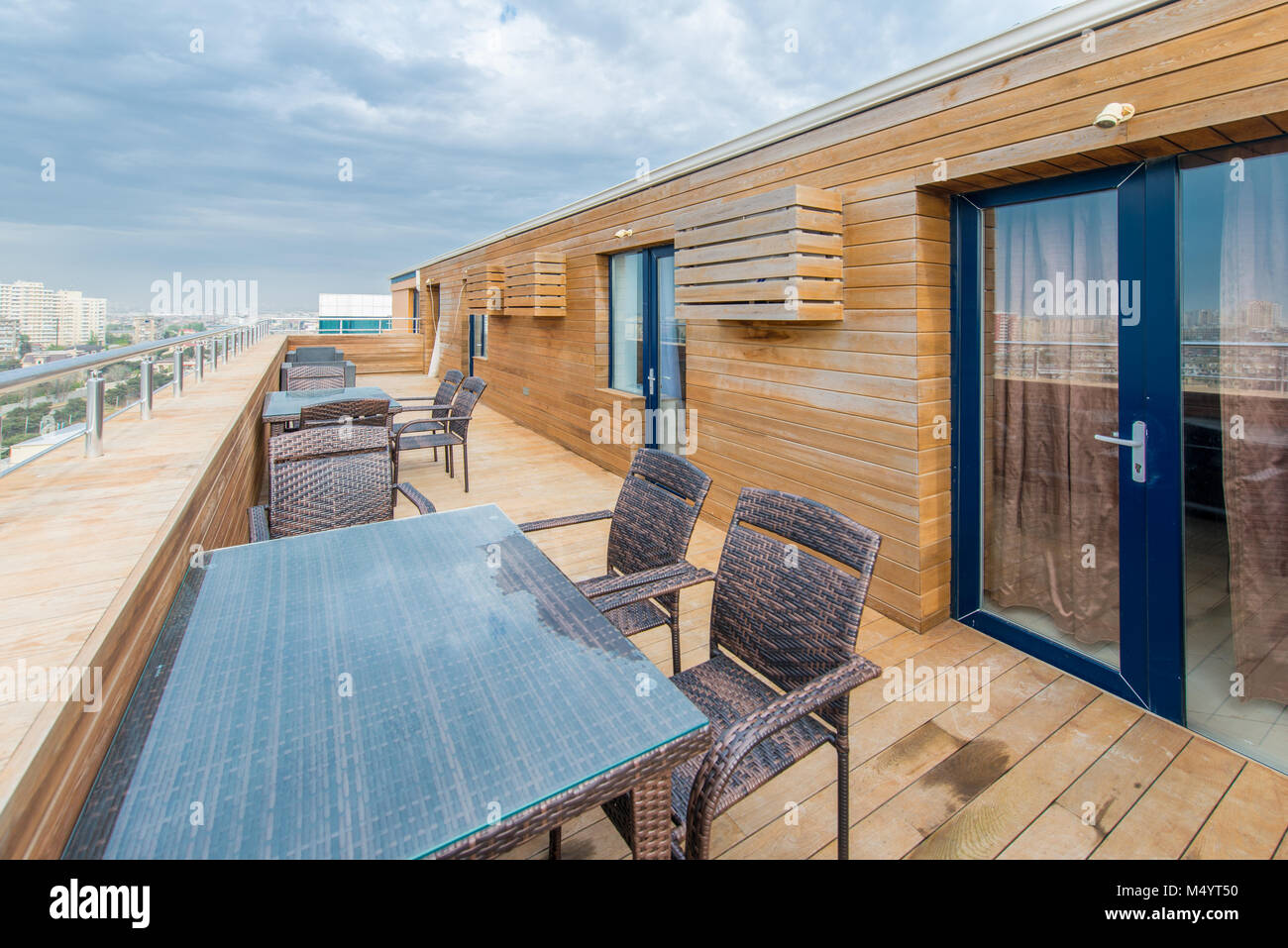 Terrace cafe on top floor Stock Photo - Alamy