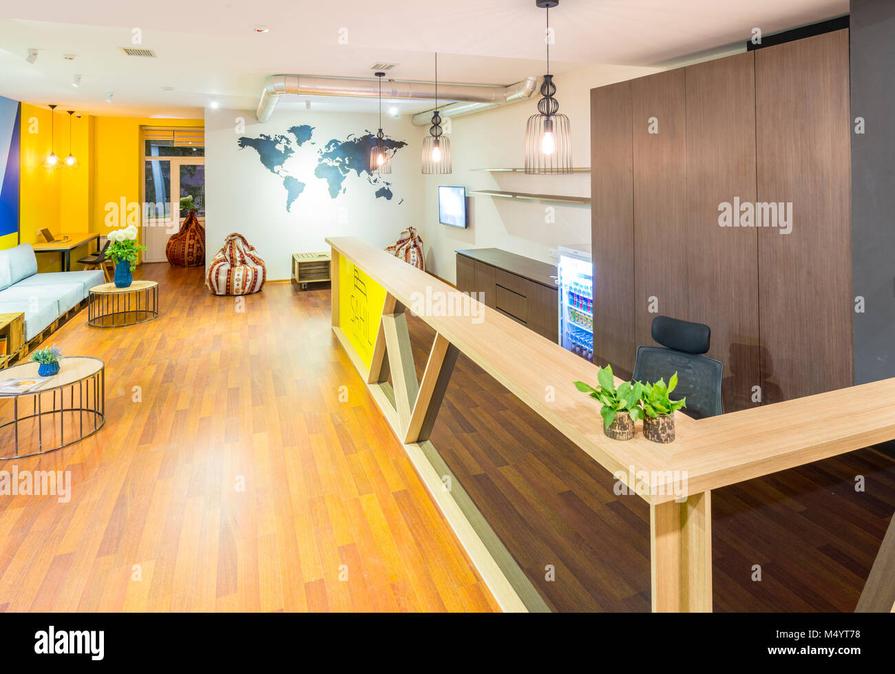Hotel reception of hostel dormitory Stock Photo - Alamy