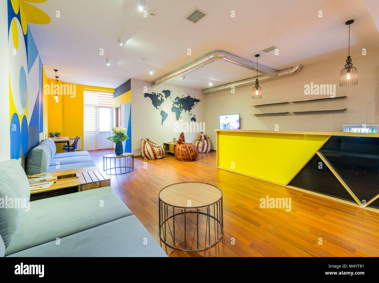 Hotel reception of hostel dormitory Stock Photo - Alamy