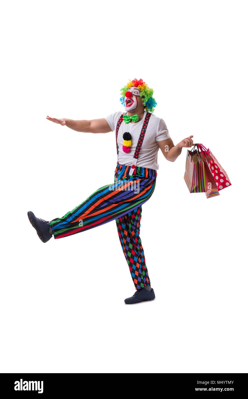 Funny clown with shopping bags isolated on white background Stock Photo ...