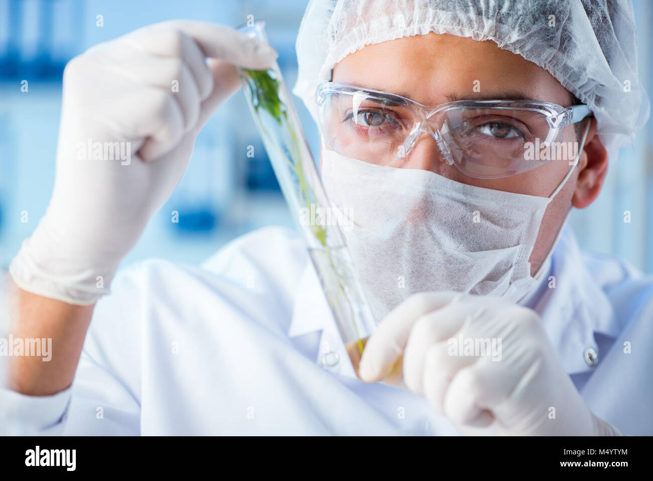 Biotechnology concept with scientist in lab Stock Photo - Alamy